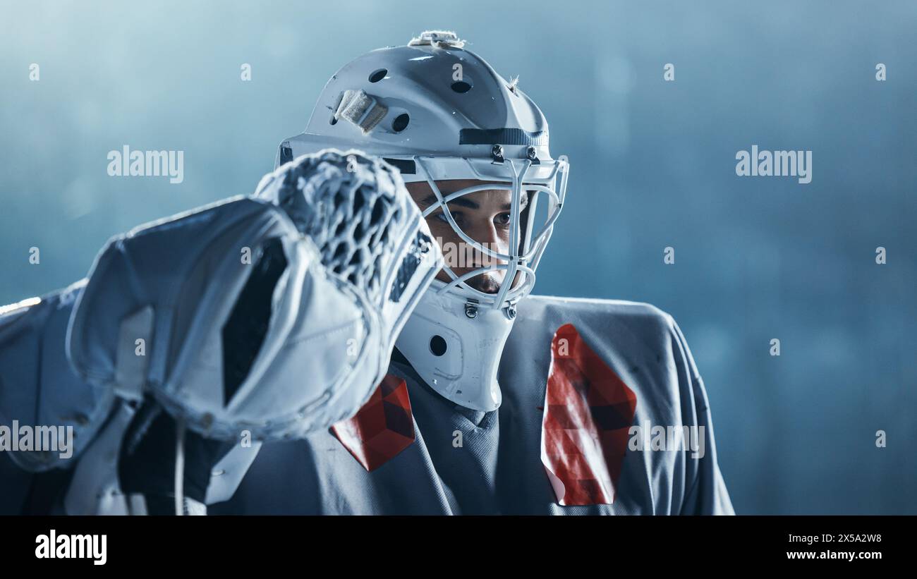 Ice Hockey Rink Arena: Portrait of Brutal Professional Goalkeeper ...