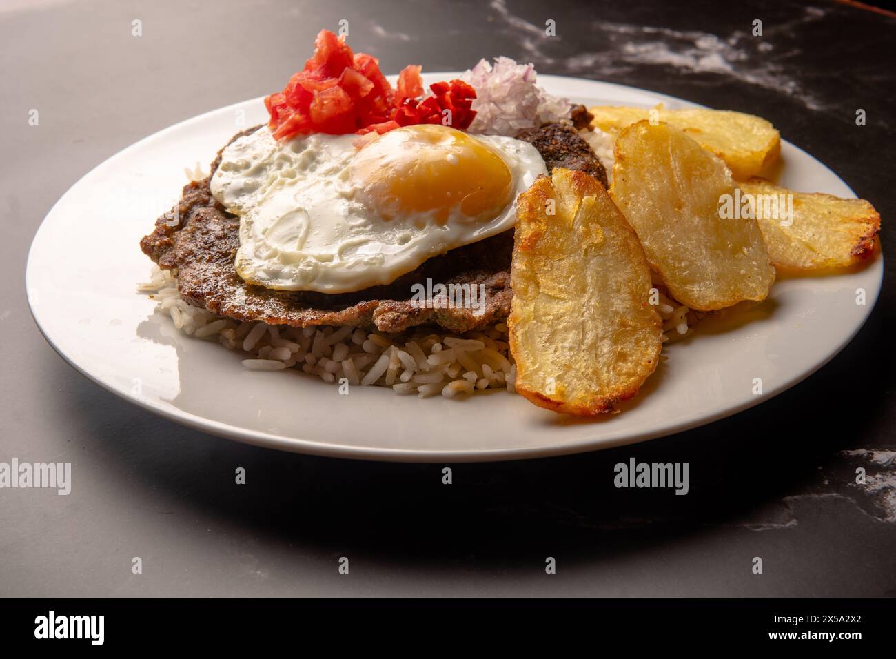Silpancho, traditional food Cochabamba Bolivia Stock Photo - Alamy