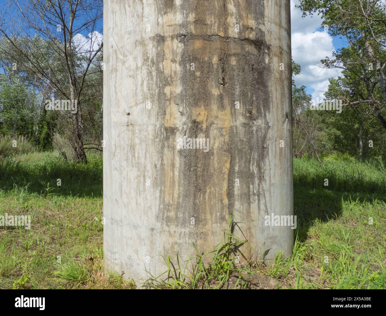 Detail of a concrete pylon supporting a railway bridge Stock Photo - Alamy