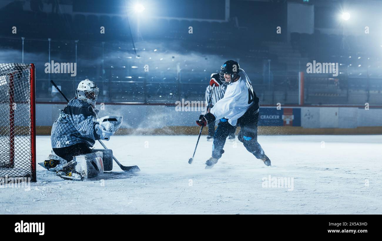 Ice Hockey Rink Arena: Goalie is Ready to Defend Score against Forward ...