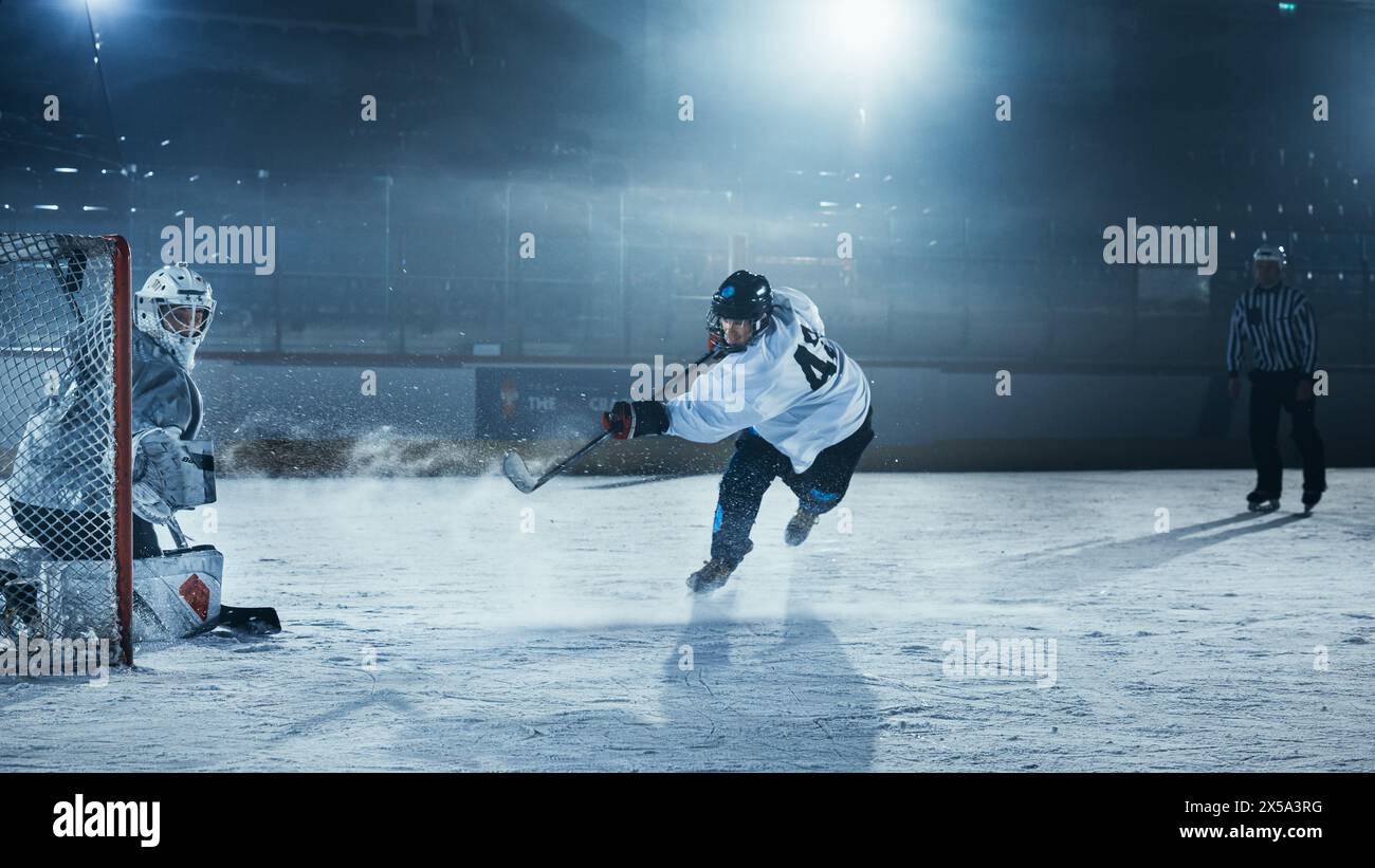 Ice Hockey Rink Arena: Goalie is Ready to Defend Score against Forward ...