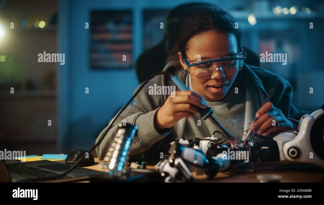 Young Teenage Multiethnic Schoolgirl is Studying Electronics and ...