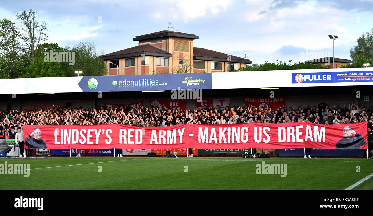 Crawley fans behind a banner of manager Scott Lindsey during the Sky ...