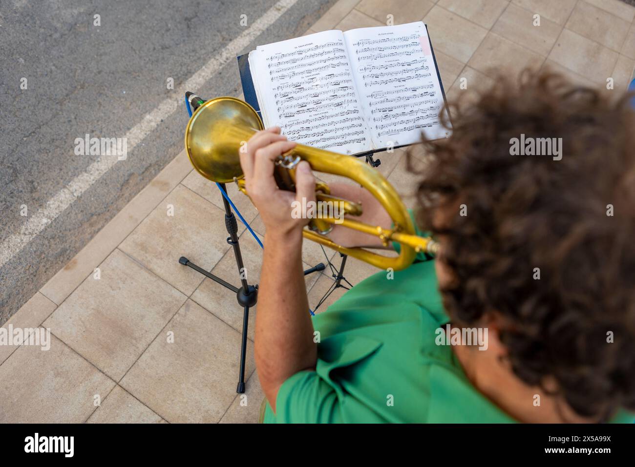 From above cropped unrecognizable resilient one-armed man plays the ...