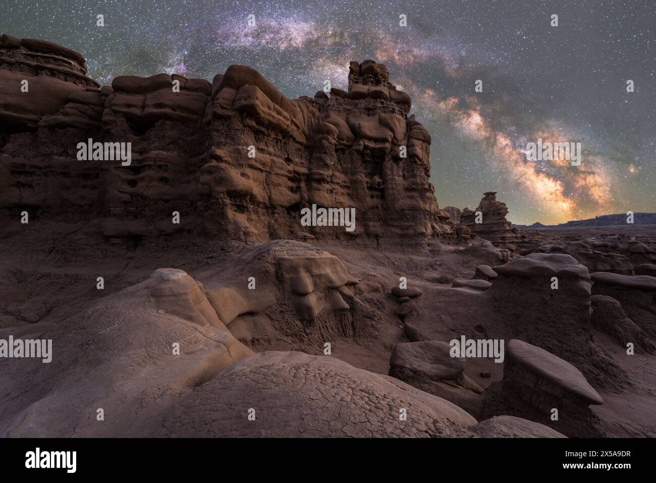 Starry night sky over the unique rock formations of Goblin Valley State ...