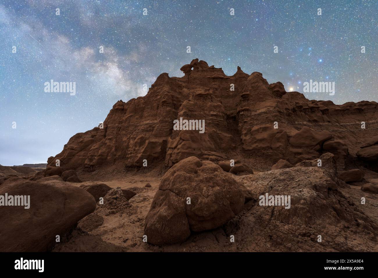 Starry night sky over the unique sandstone formations of Goblin Valley ...