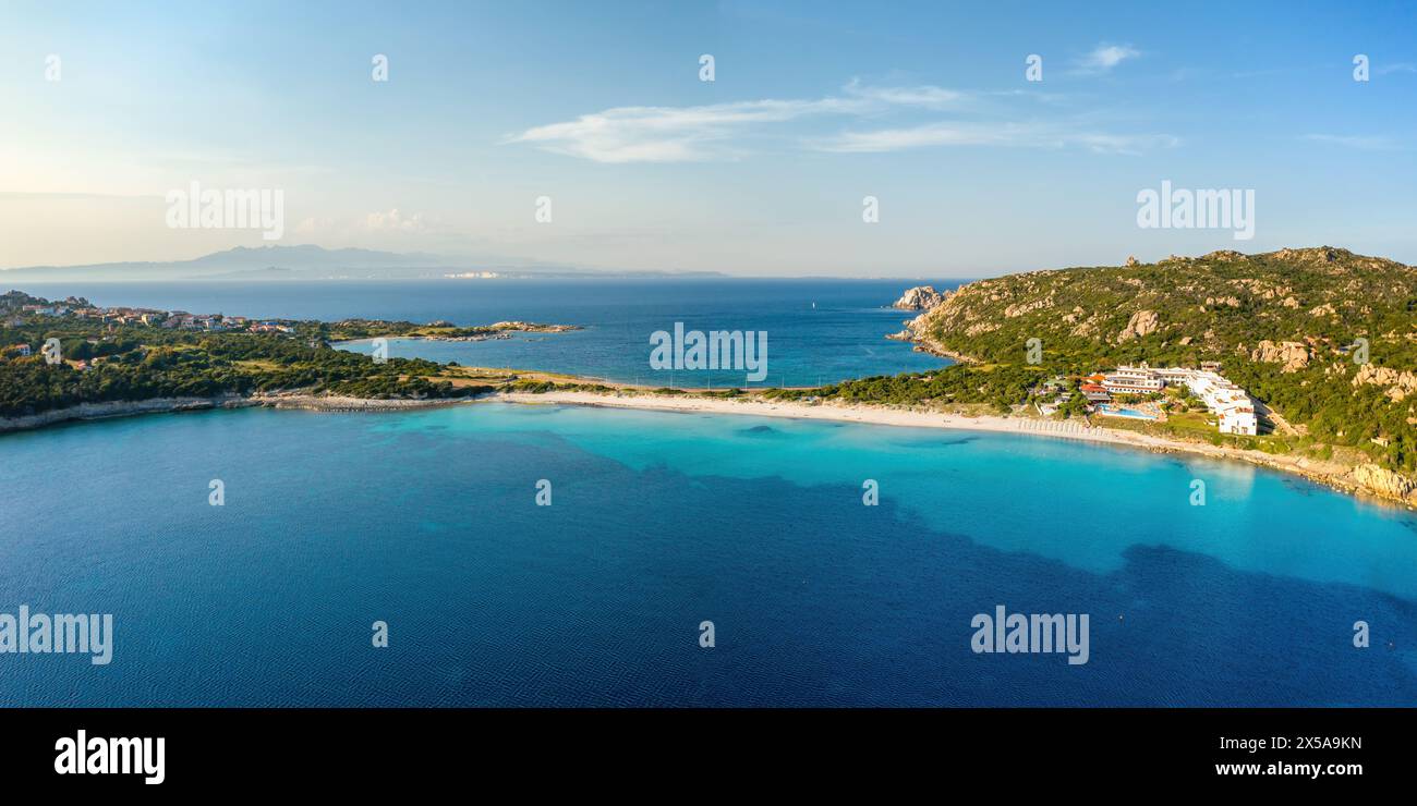 An aerial shot displays the stunning turquoise sea of Rena di Ponente ...