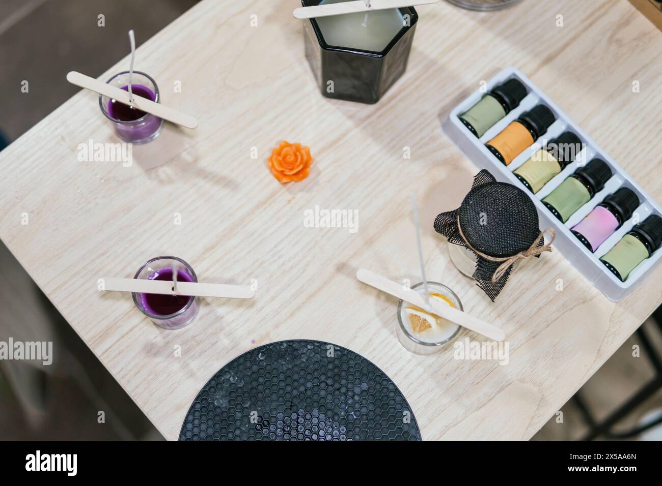 An overhead shot captures a creative essential oil blending workshop ...