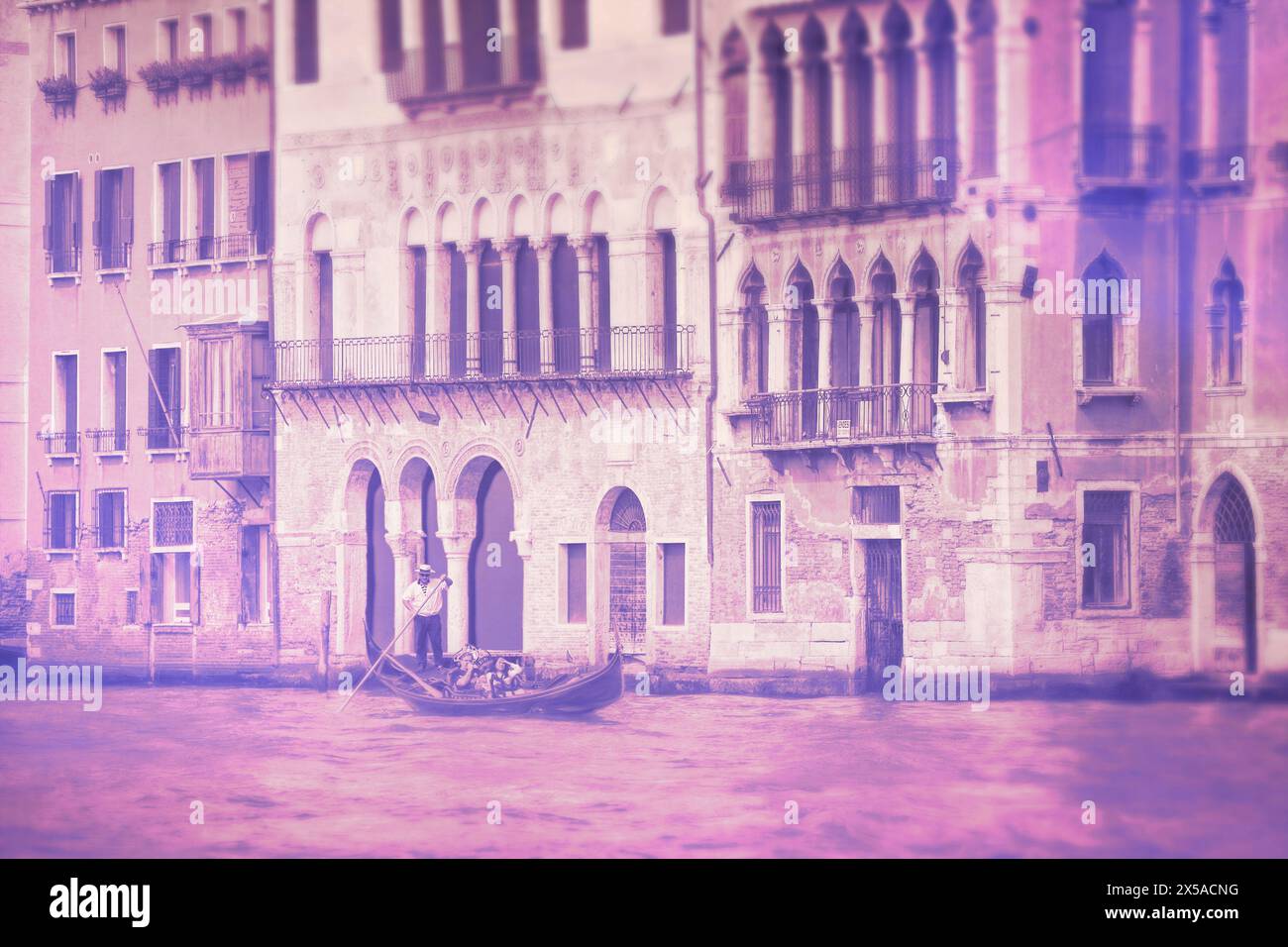 Gondole floats down the Grand Canal in Venice, Italy Stock Photo - Alamy