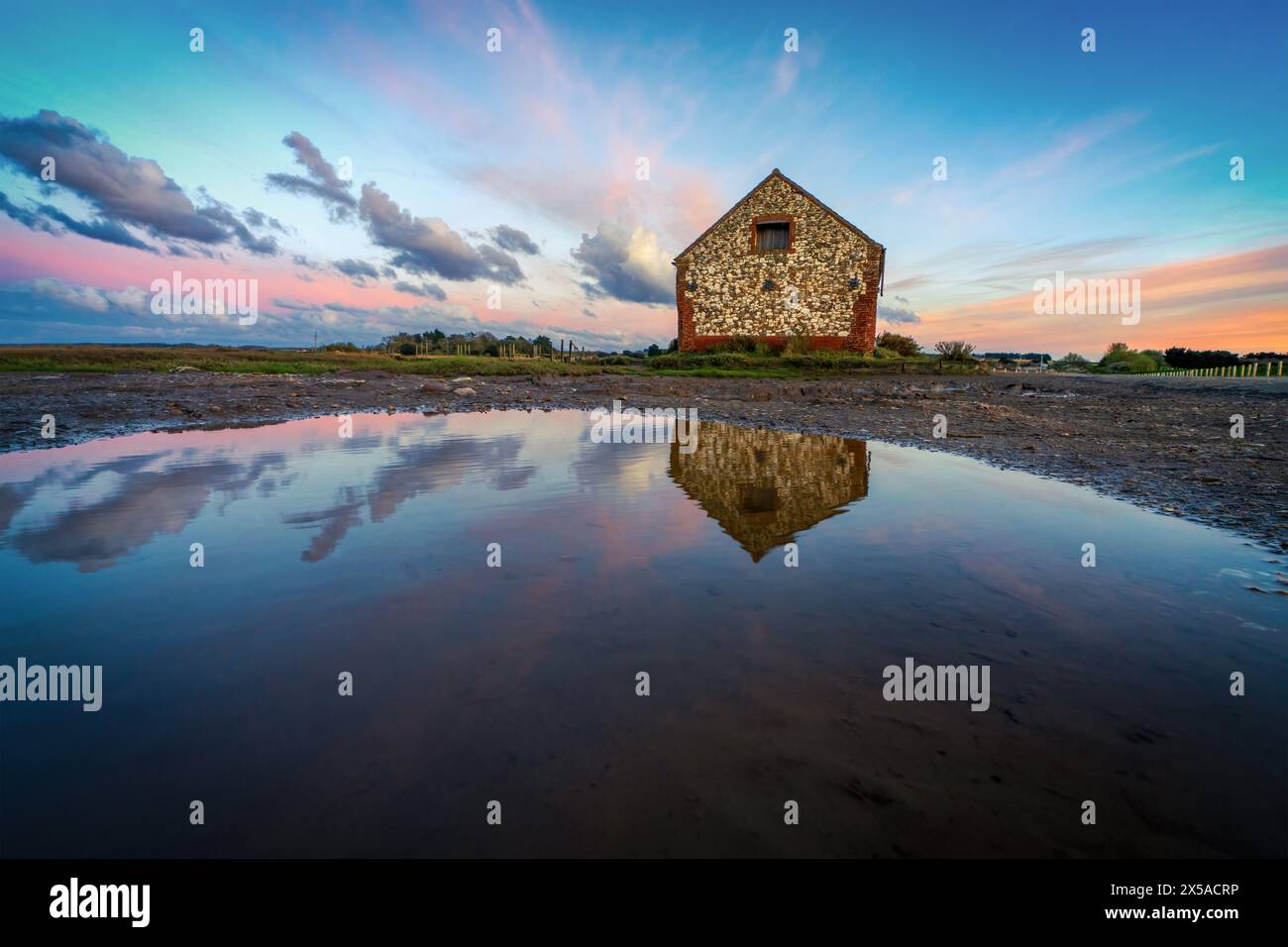 The old Coal Barn and Quay at Thornham Old Harbour, during sunset ...