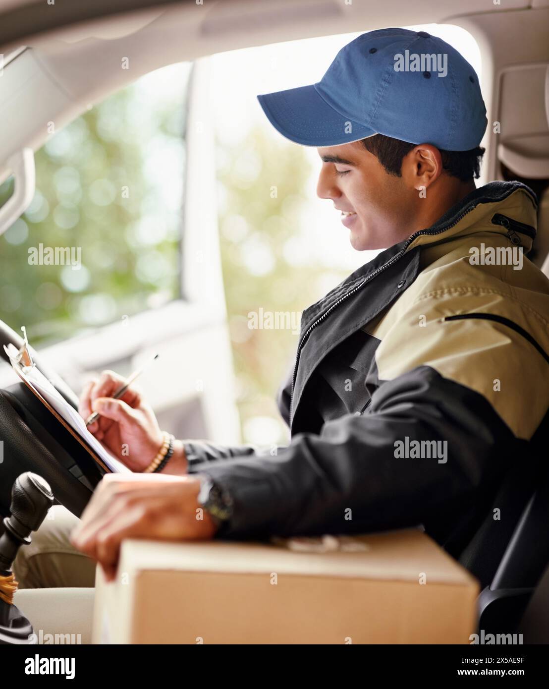 Business man checking clipboard documents hi-res stock photography and ...