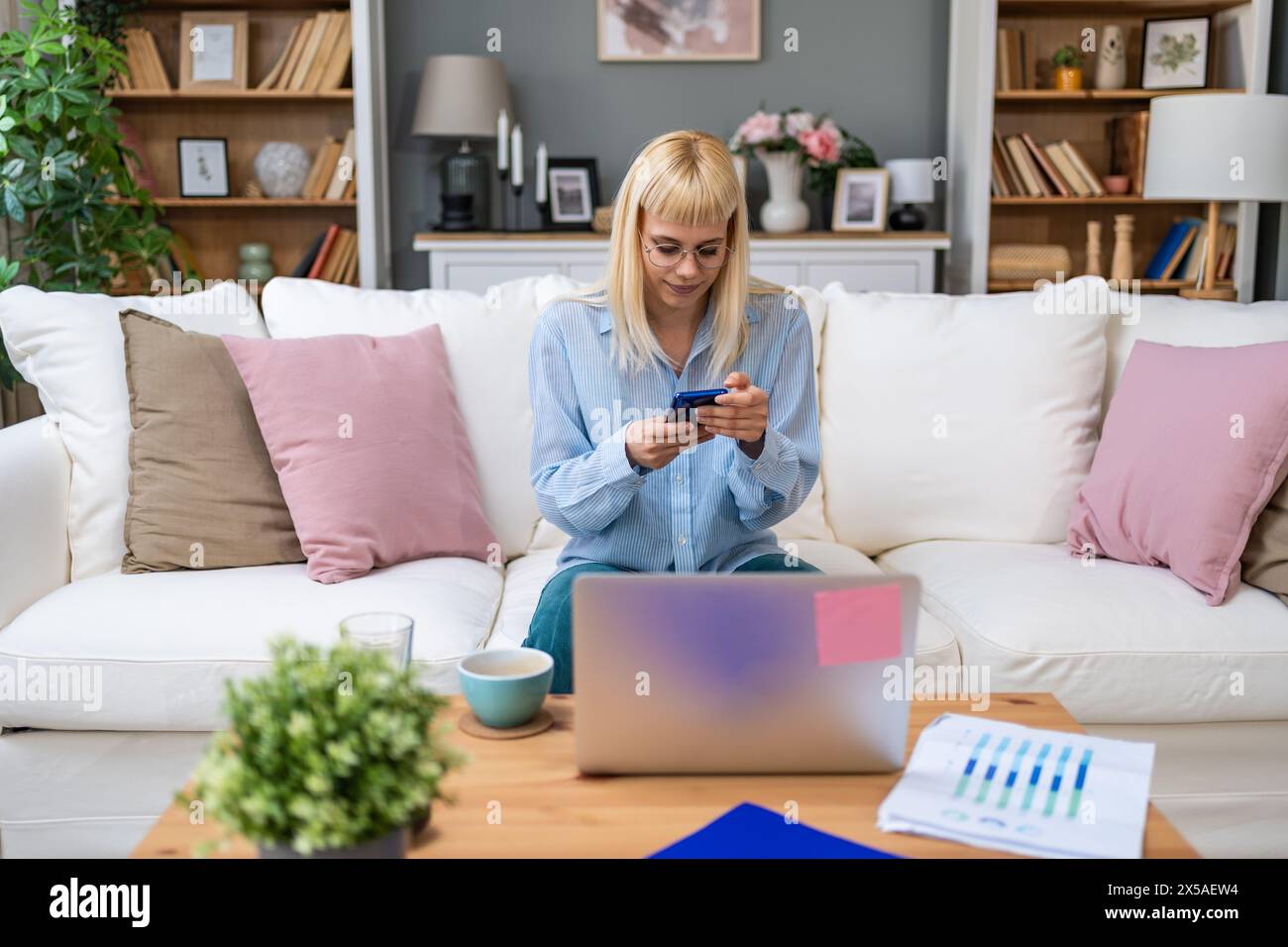 Career winner mindset. Young freelance businesswoman working at home ...