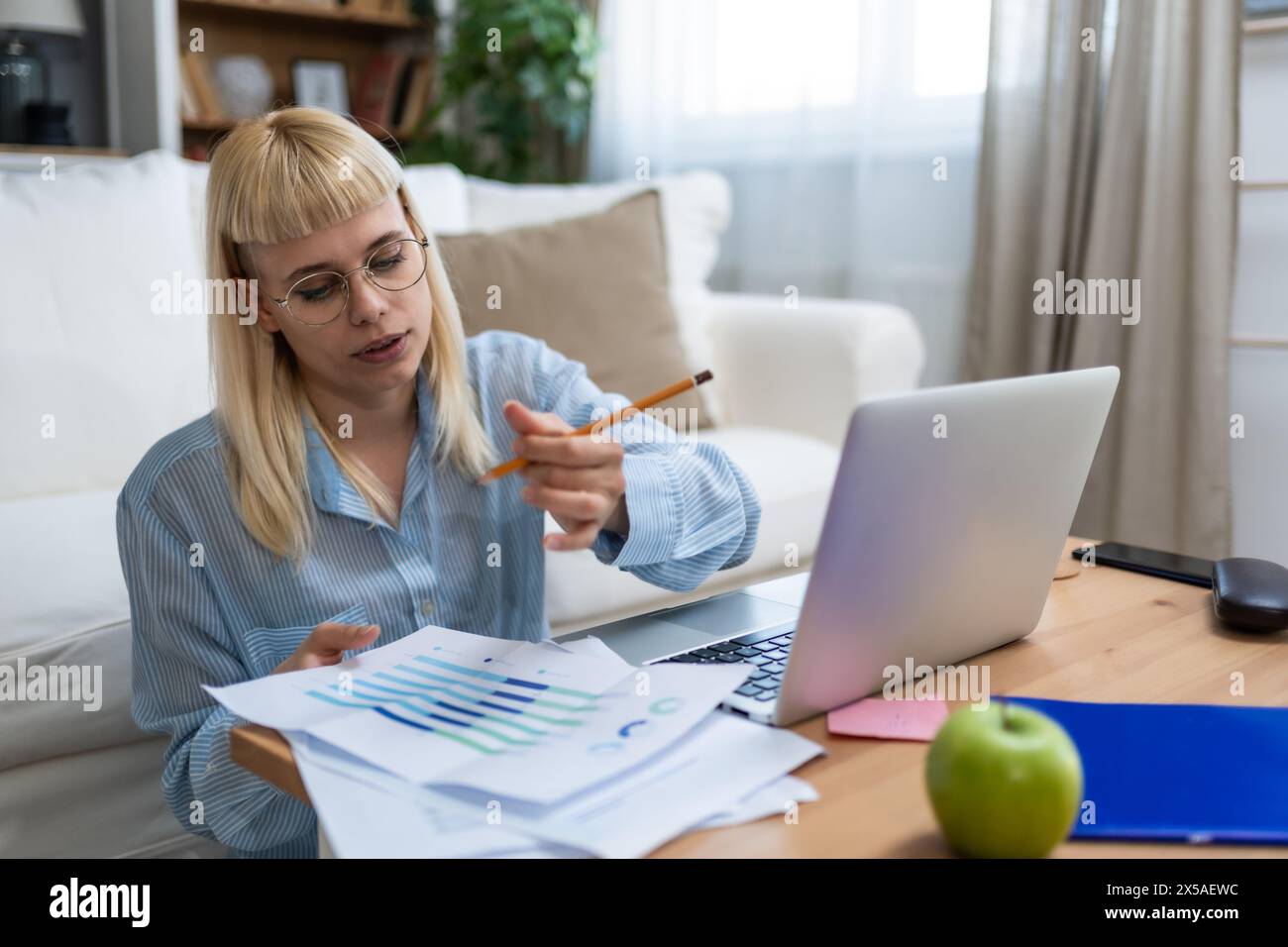 Career winner mindset. Young freelance businesswoman working at home ...