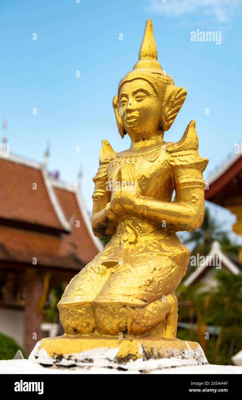 Deity statue, Wat Sensoukaram, Luang Prabang, Laos Stock Photo - Alamy