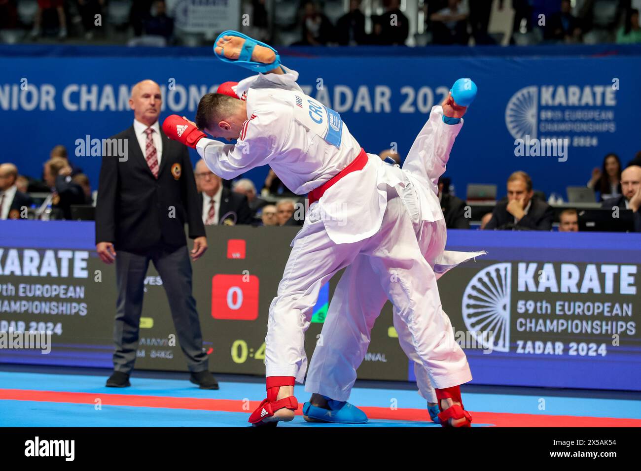 Zadar, Croatia. 08th May, 2024. Ivan Kvesic (red) of Croatia and ...