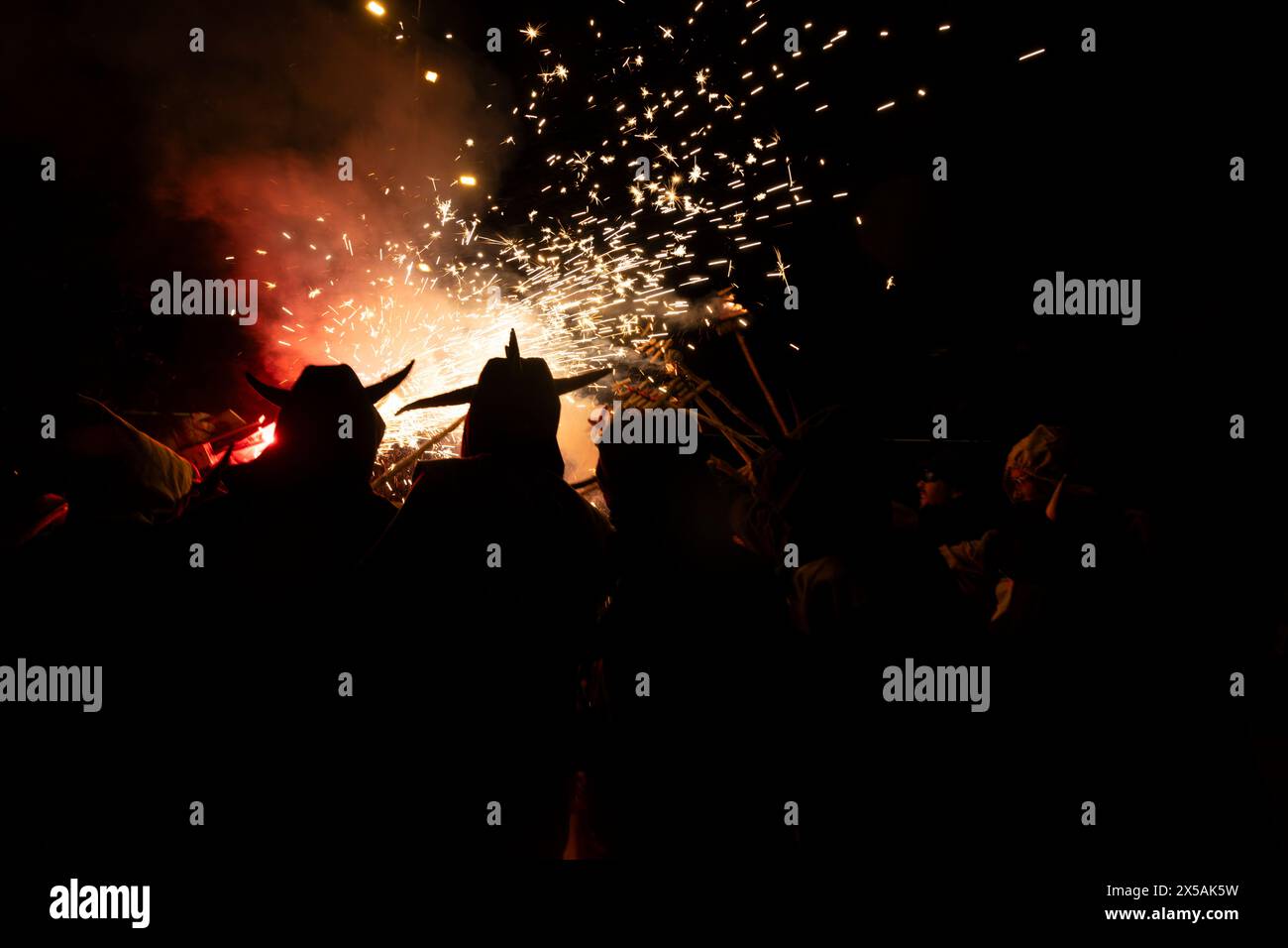 The closing moments of the Correfocs parade Stock Photo - Alamy