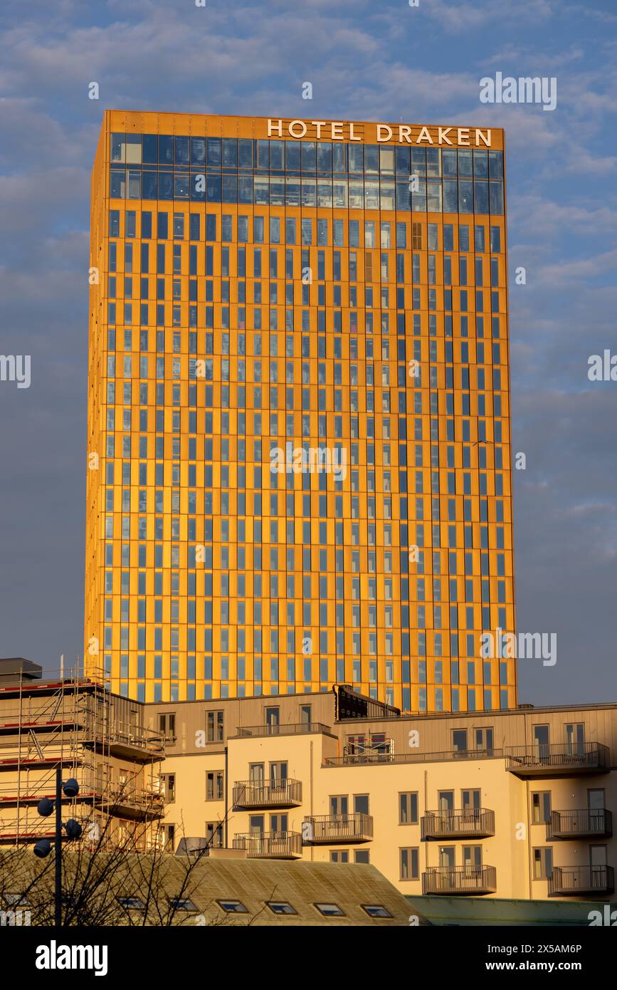 Hotel high rise building towering above residential buildings at ...