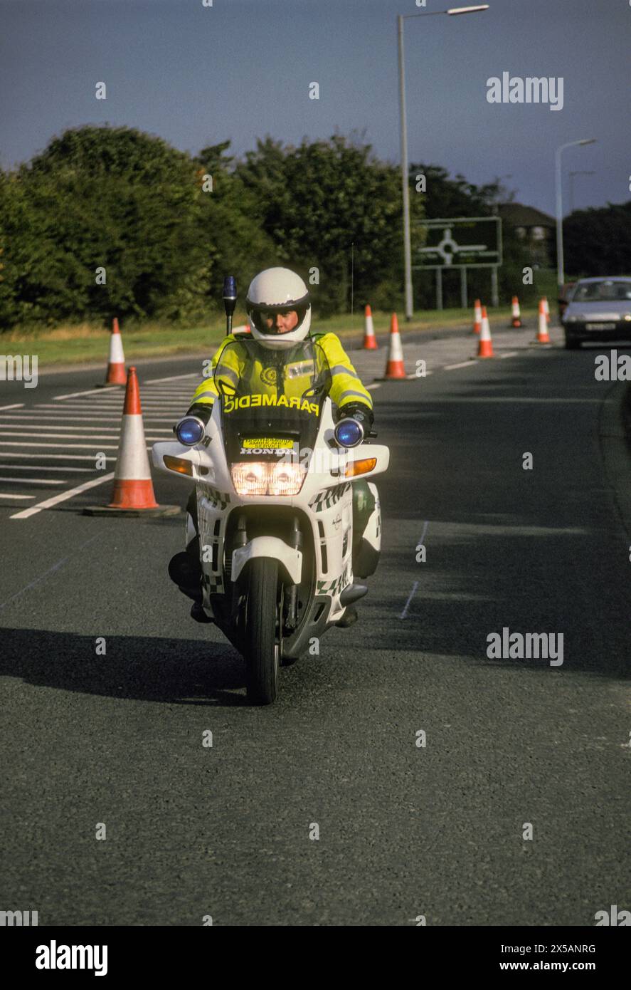 Paramedic on a motorcycle Stock Photo - Alamy
