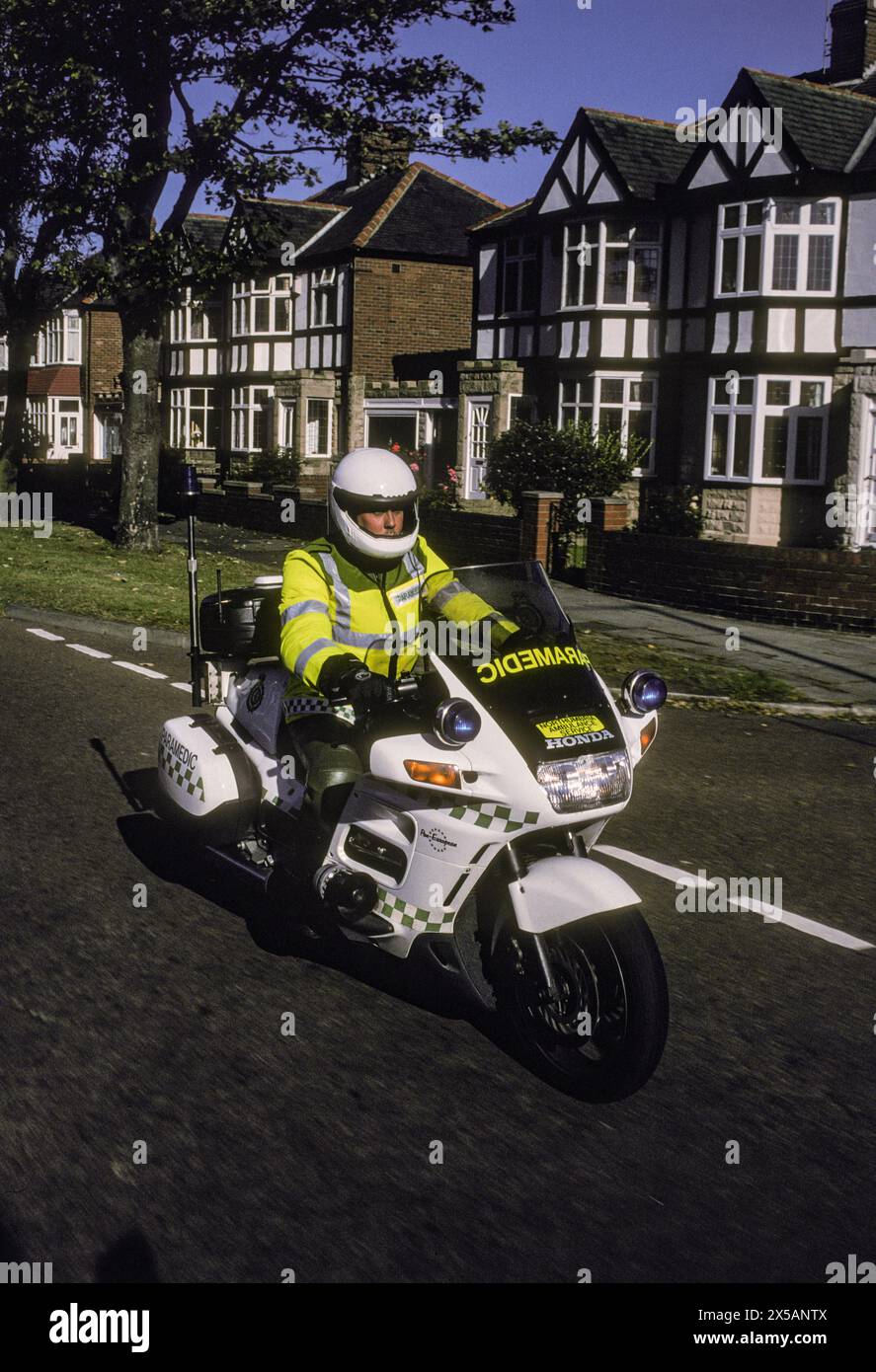 Paramedic on a motorcycle Stock Photo - Alamy