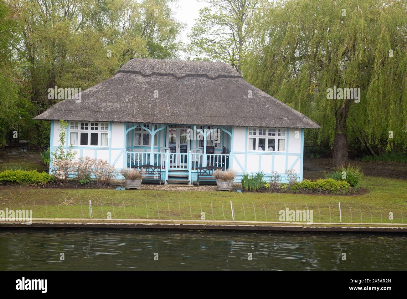 Wroxham, Norfolk, England, April, 2024, upmarket houses on the edge of ...