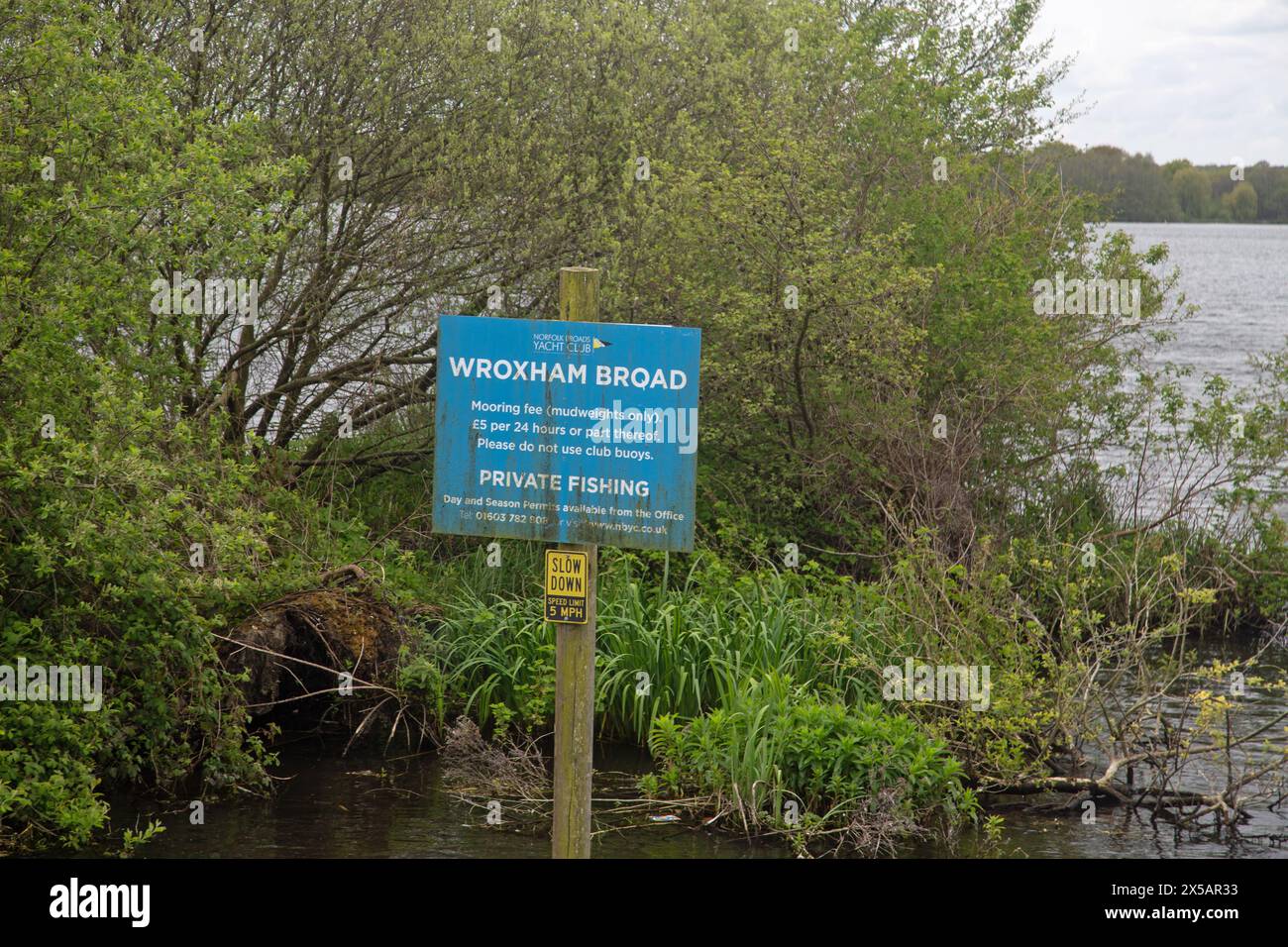Wroxham, Norfolk, England, April, 2024 A sign advises people of mooring ...