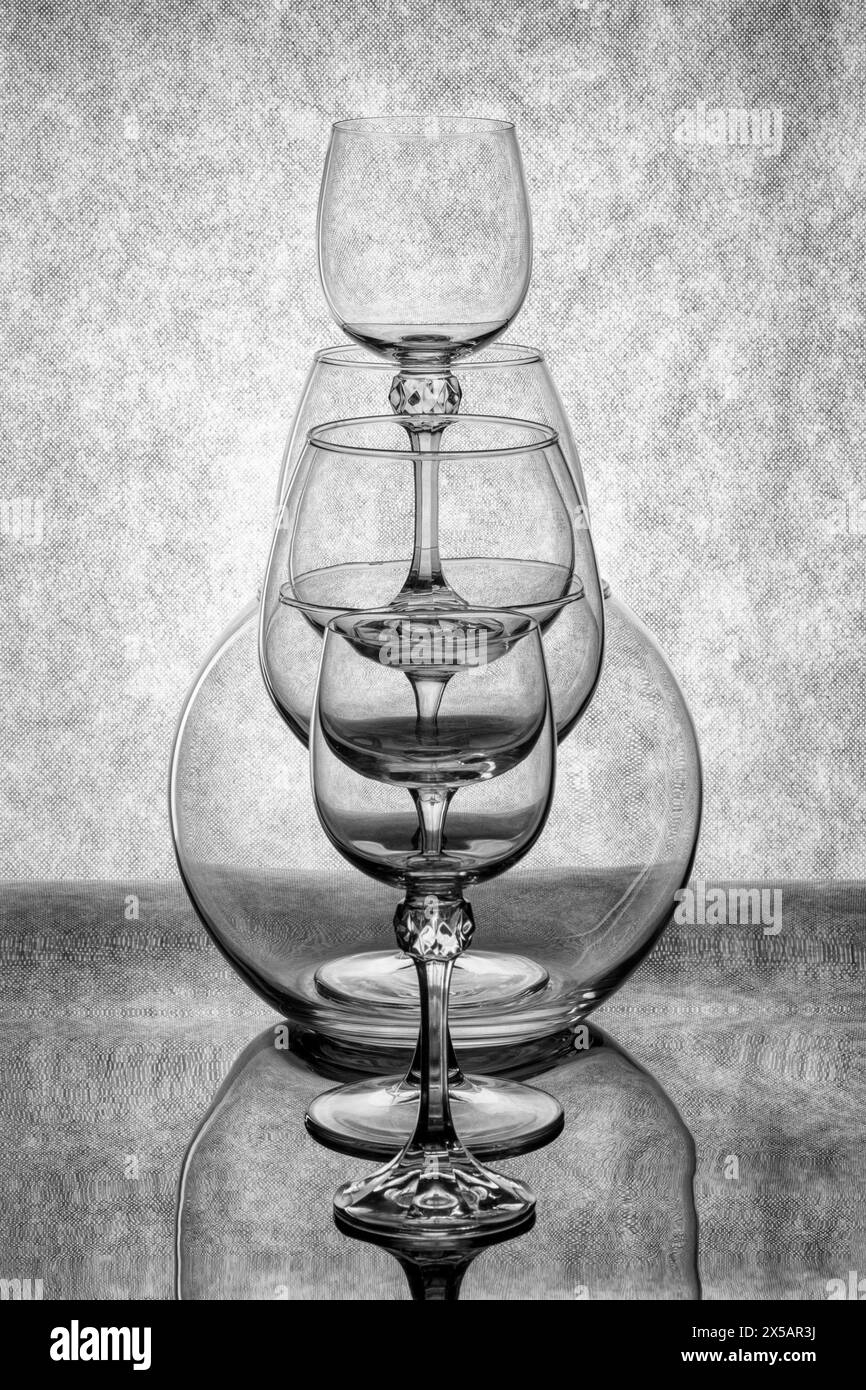 Still life with glassware on a reflective surface Stock Photo - Alamy