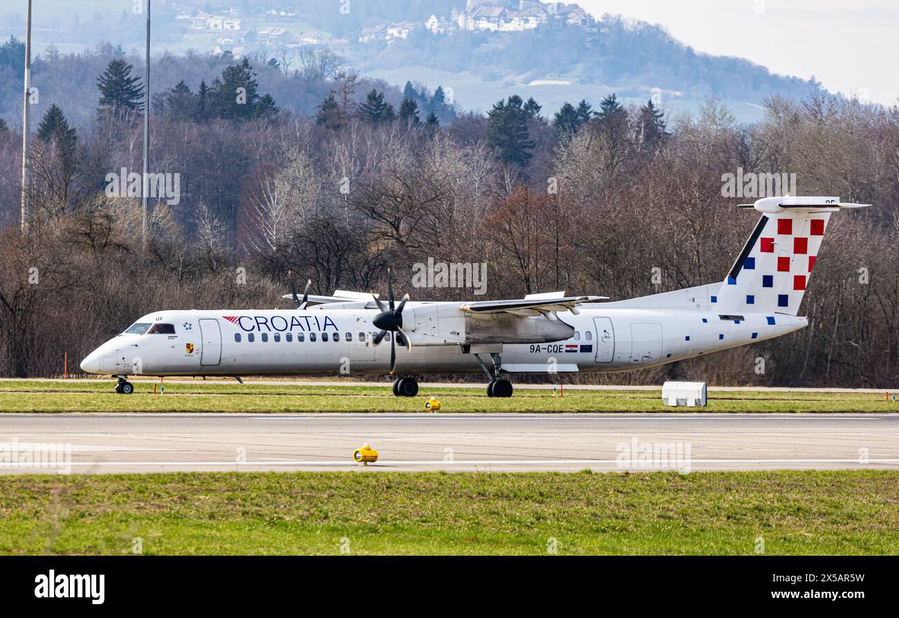 A Bombardier Dash 8 Q400 from Croatia Airlines taxis to the terminal ...