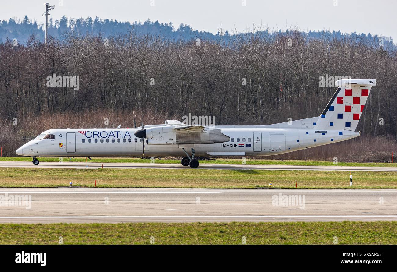 A Bombardier Dash 8 Q400 from Croatia Airlines taxis to the terminal ...
