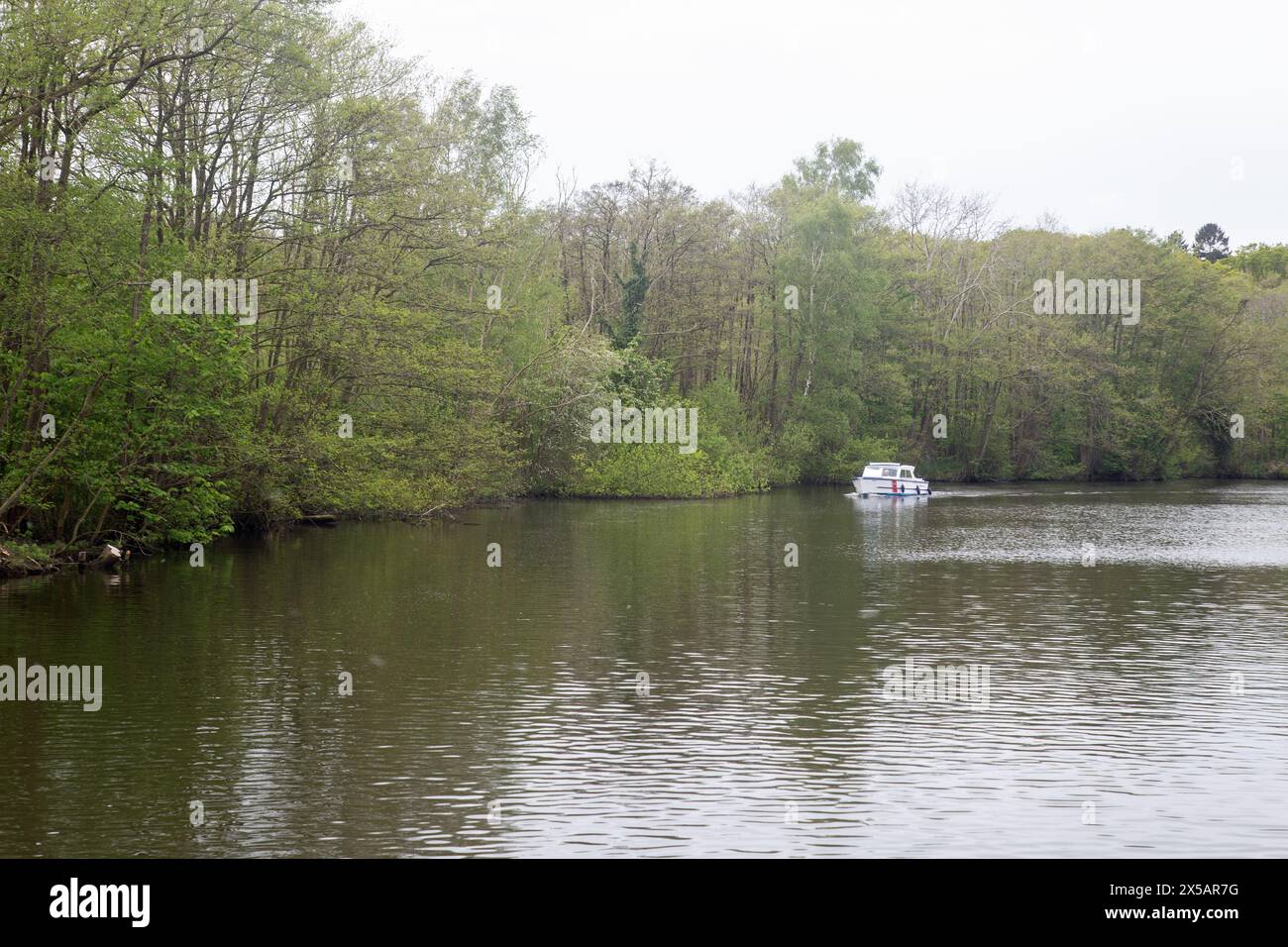 Wroxham, Norfolk, England, April, 2024 landscape format shot of a boat ...