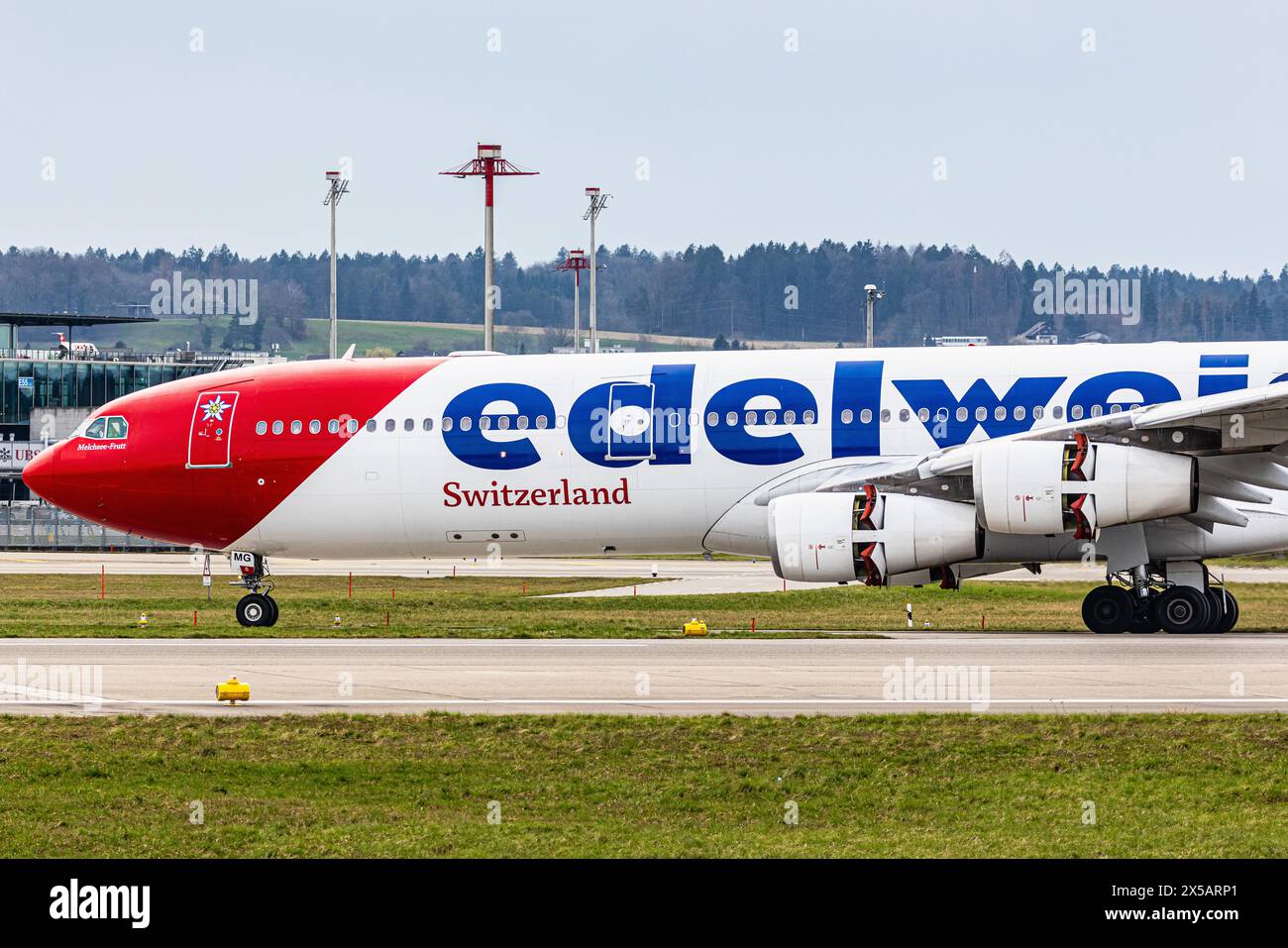An Edelweiss Air Airbus A340-313X has landed on the runway at Zurich ...