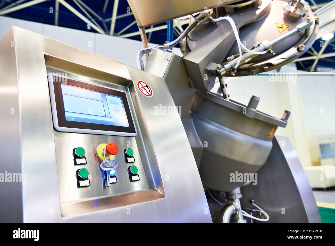 Industrial multifunctional mixer for cheese production Stock Photo - Alamy