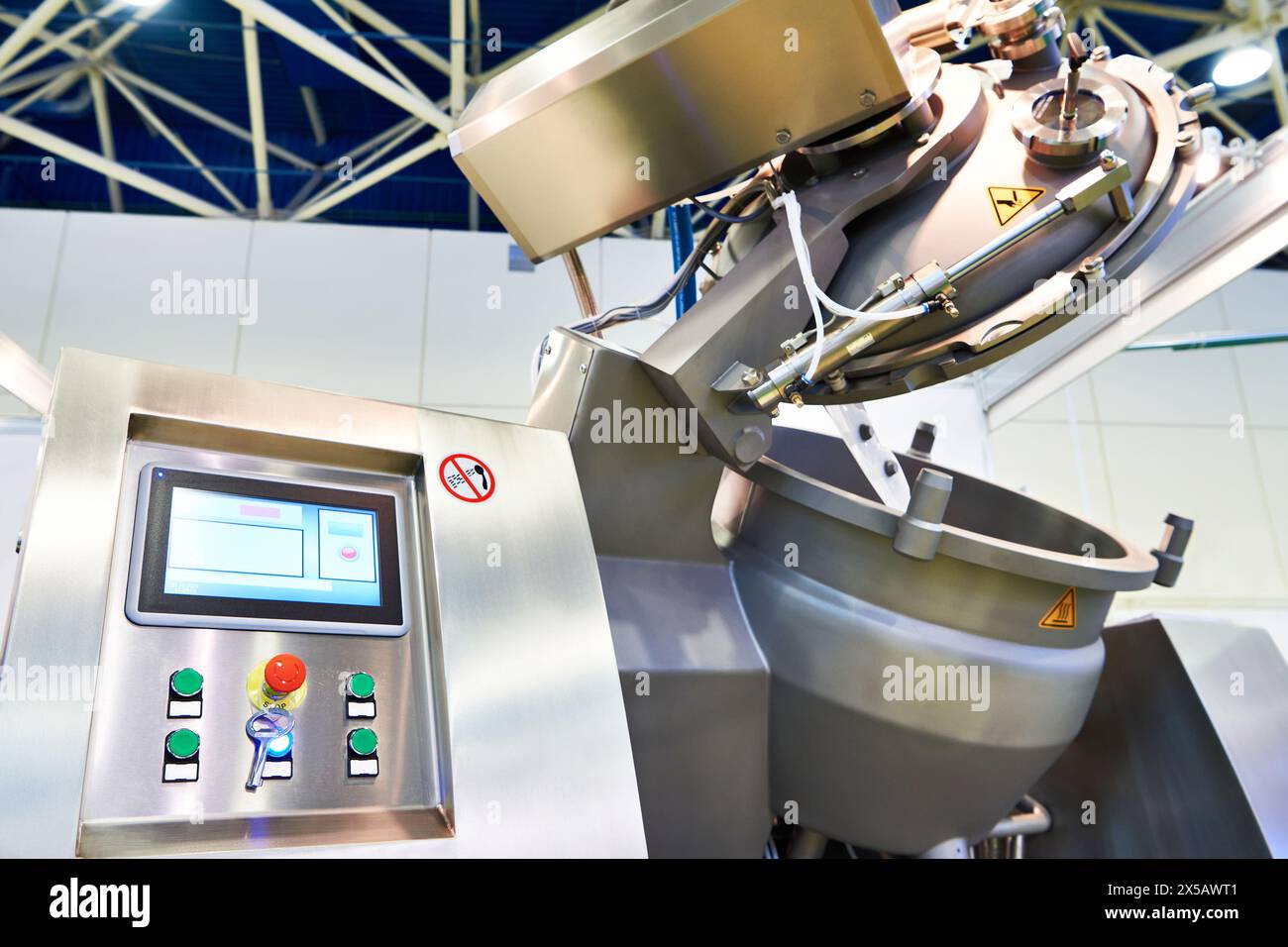 Industrial multifunctional mixer for cheese production Stock Photo - Alamy
