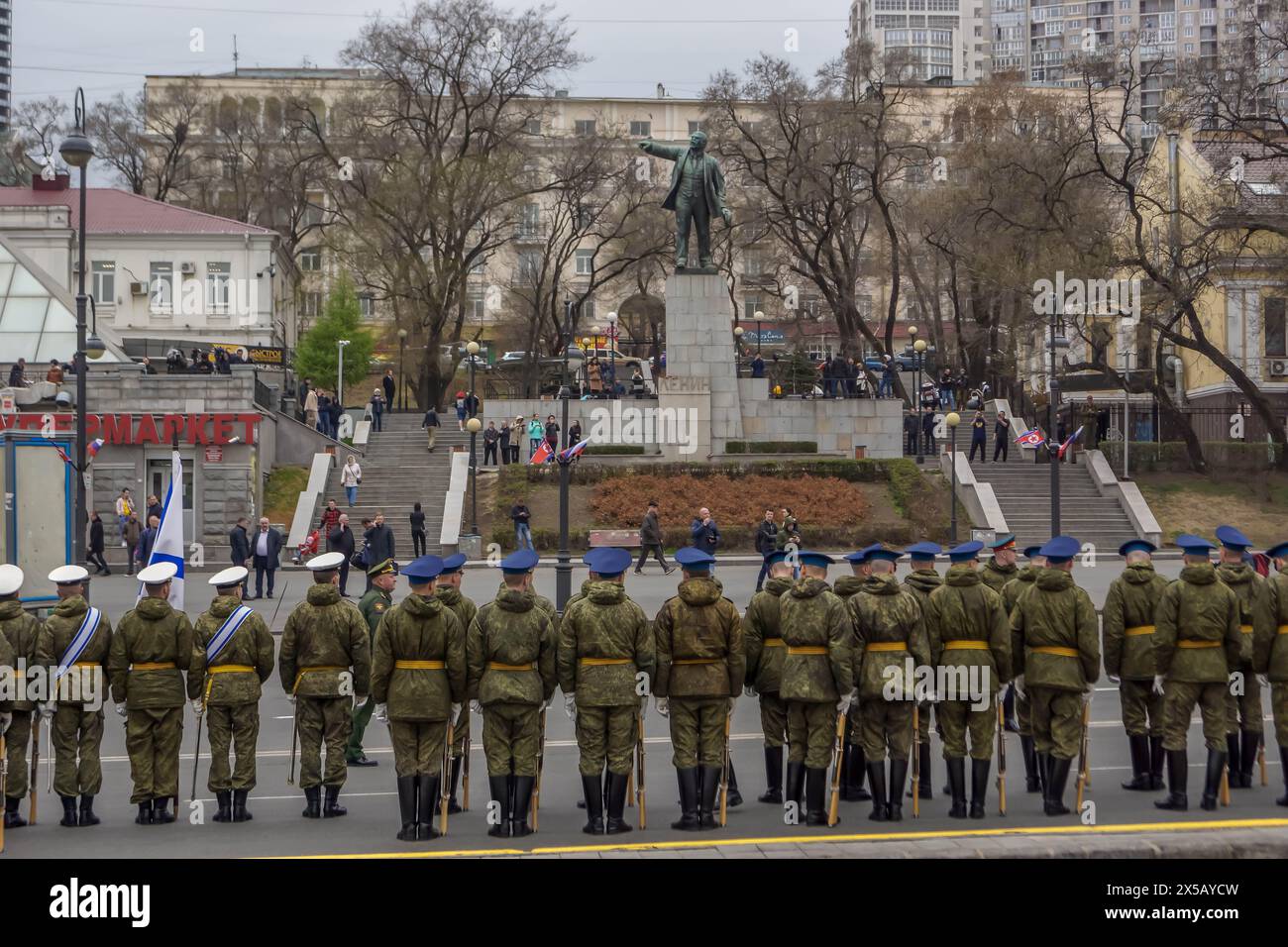 The Russian soldiers in front of Vladimir Lenin statue, as a ...