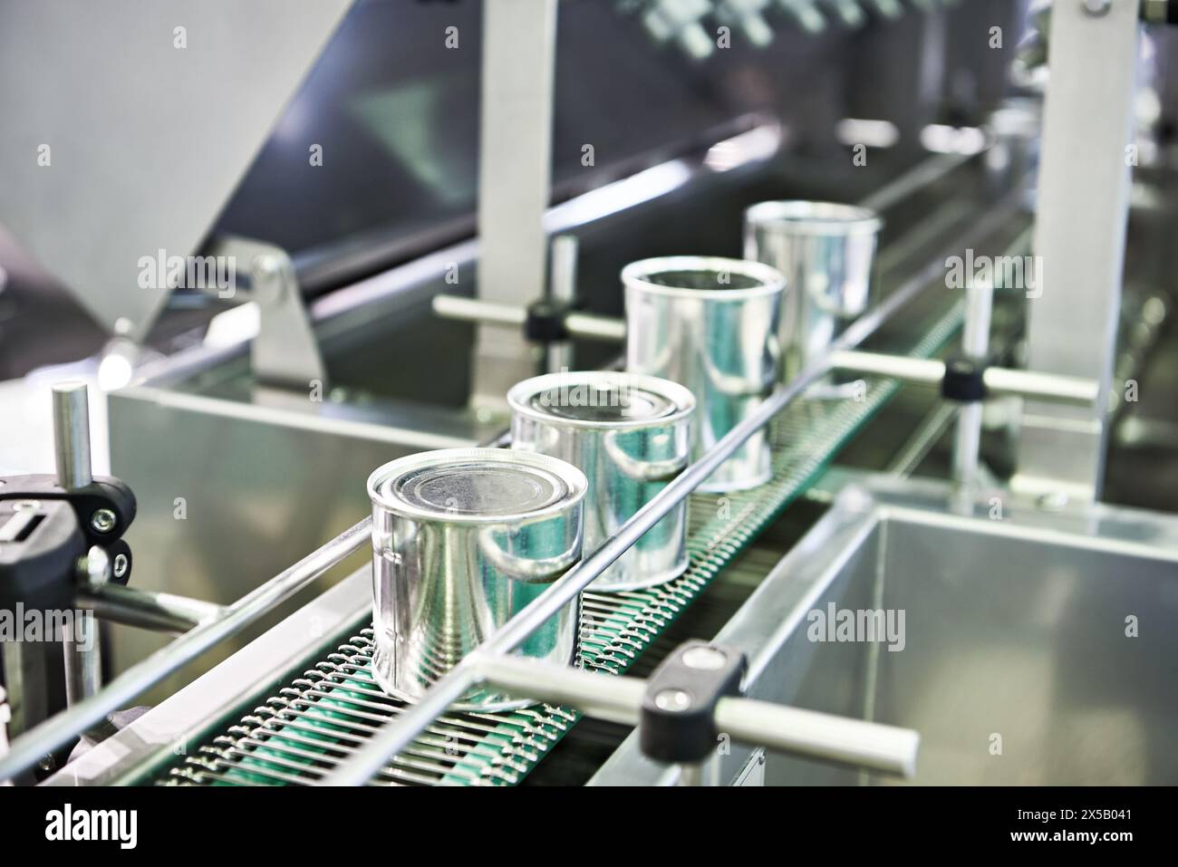 Automatic line for the production of cans Stock Photo - Alamy