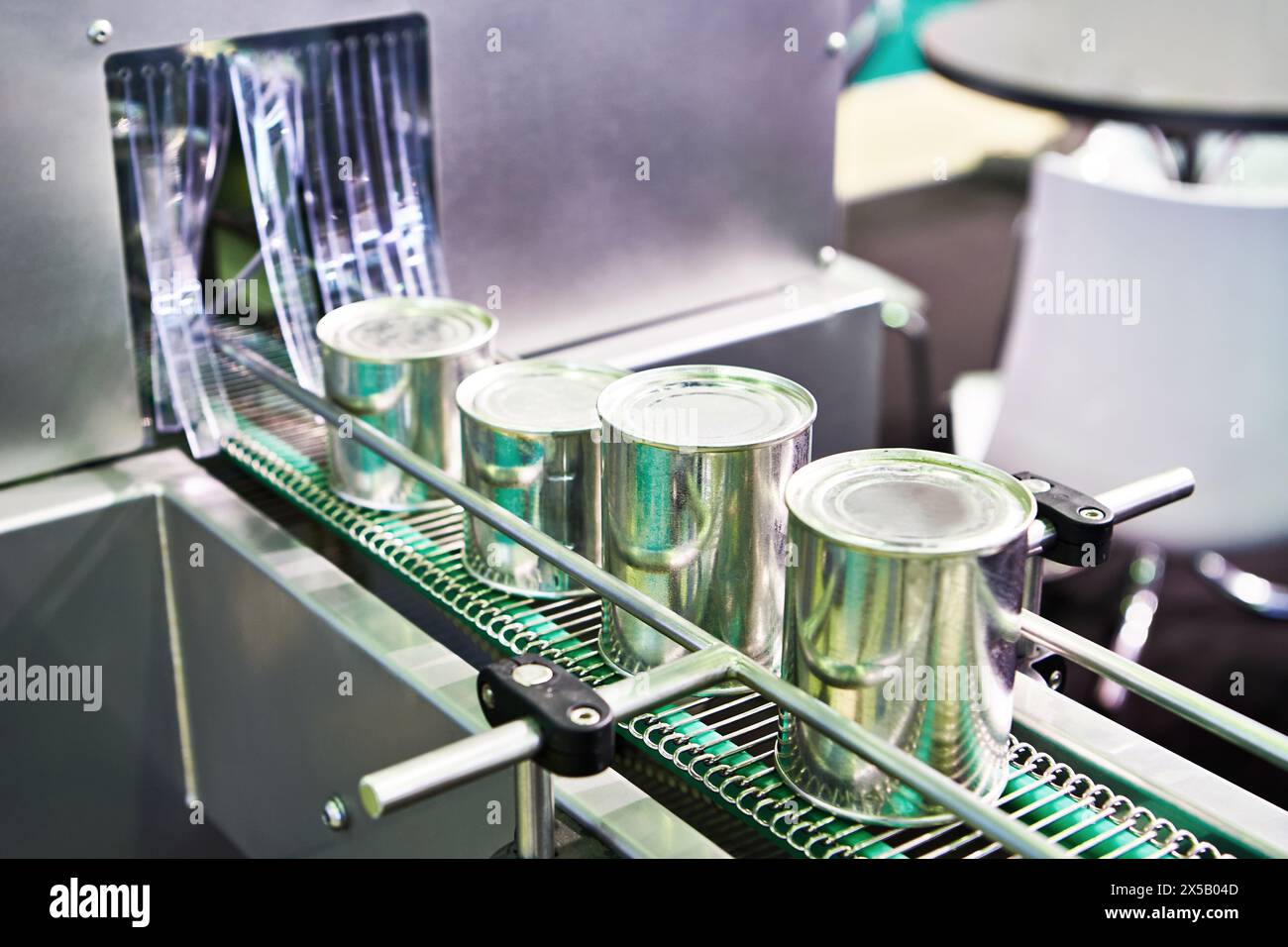 Automatic line for the production of cans Stock Photo - Alamy