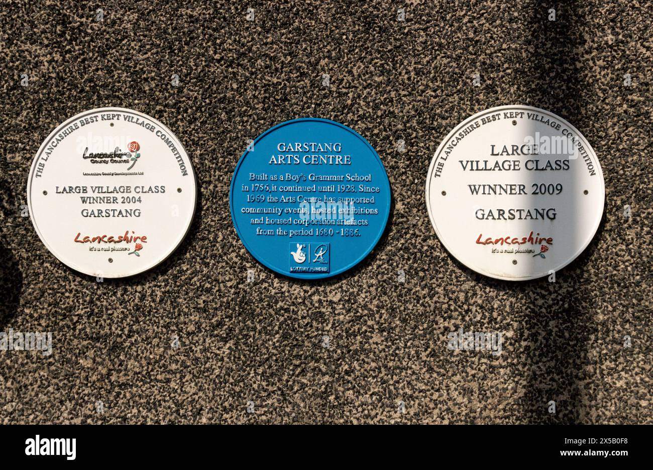 White plaques for Garstang Best Kept Village, with Garstang Arts Centre ...