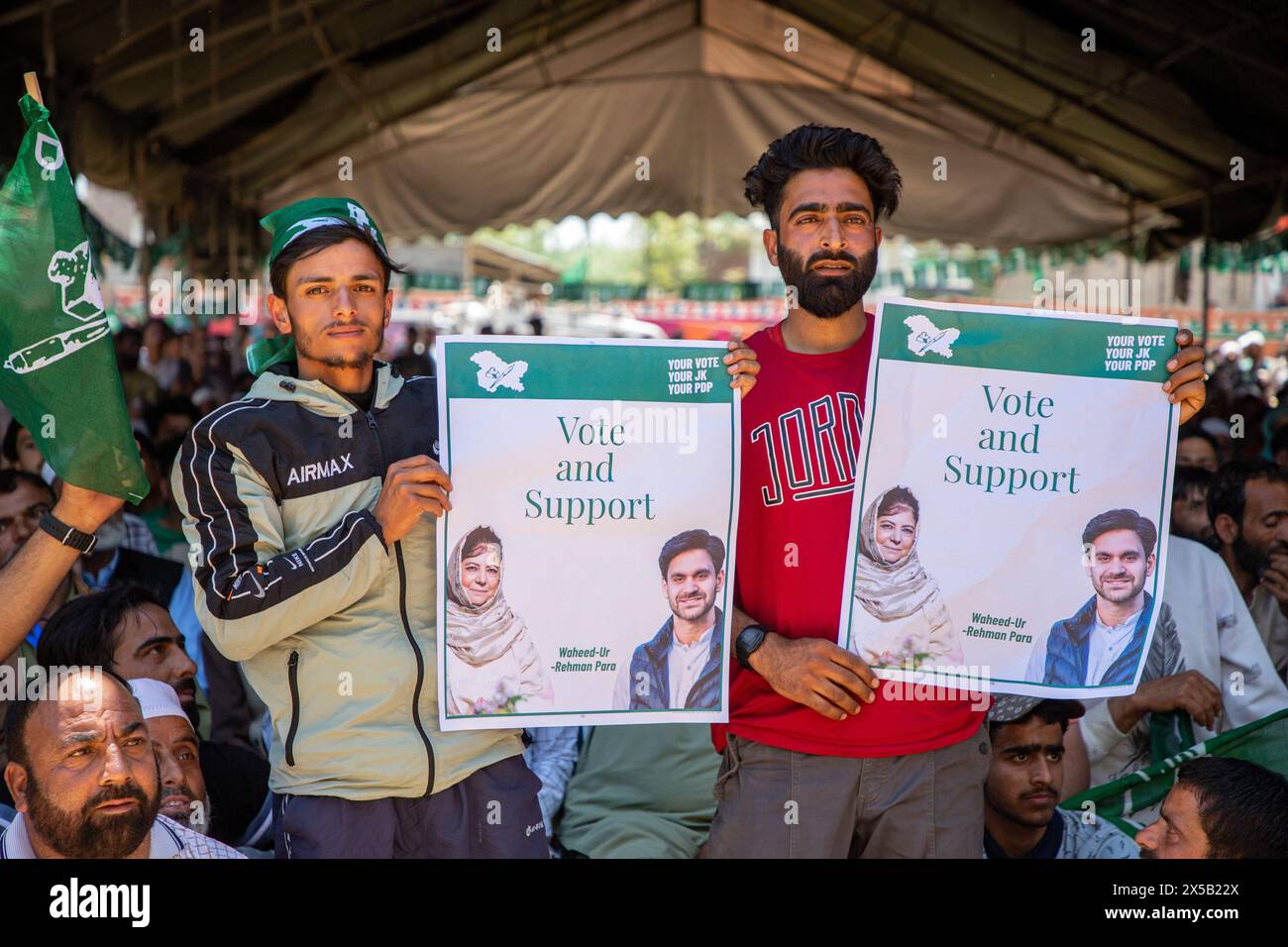Supporters of the Jammu and Kashmir Peoples Democratic Party (PDP) hold ...