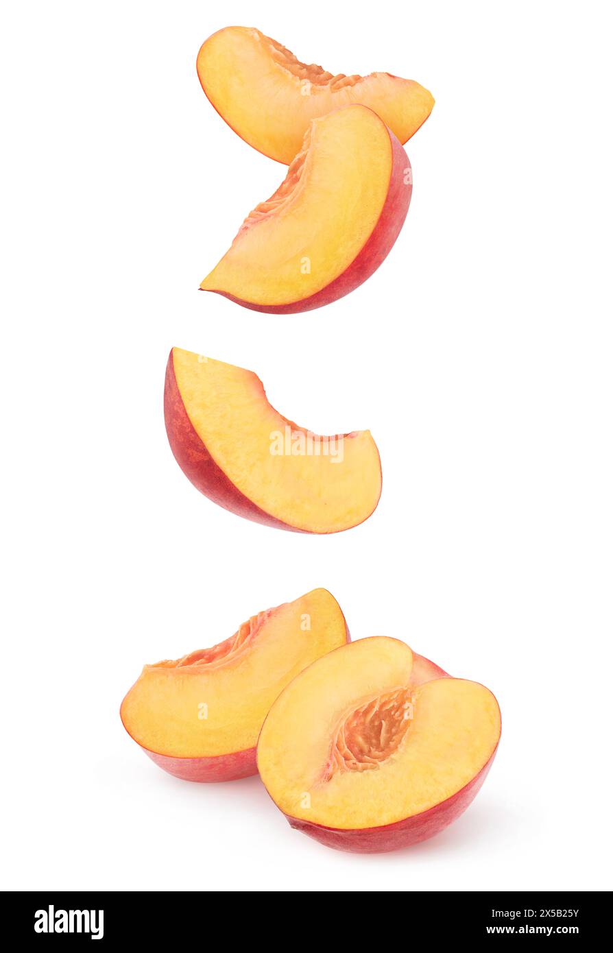 Pieces of falling fresh peach isolated on white background Stock Photo ...
