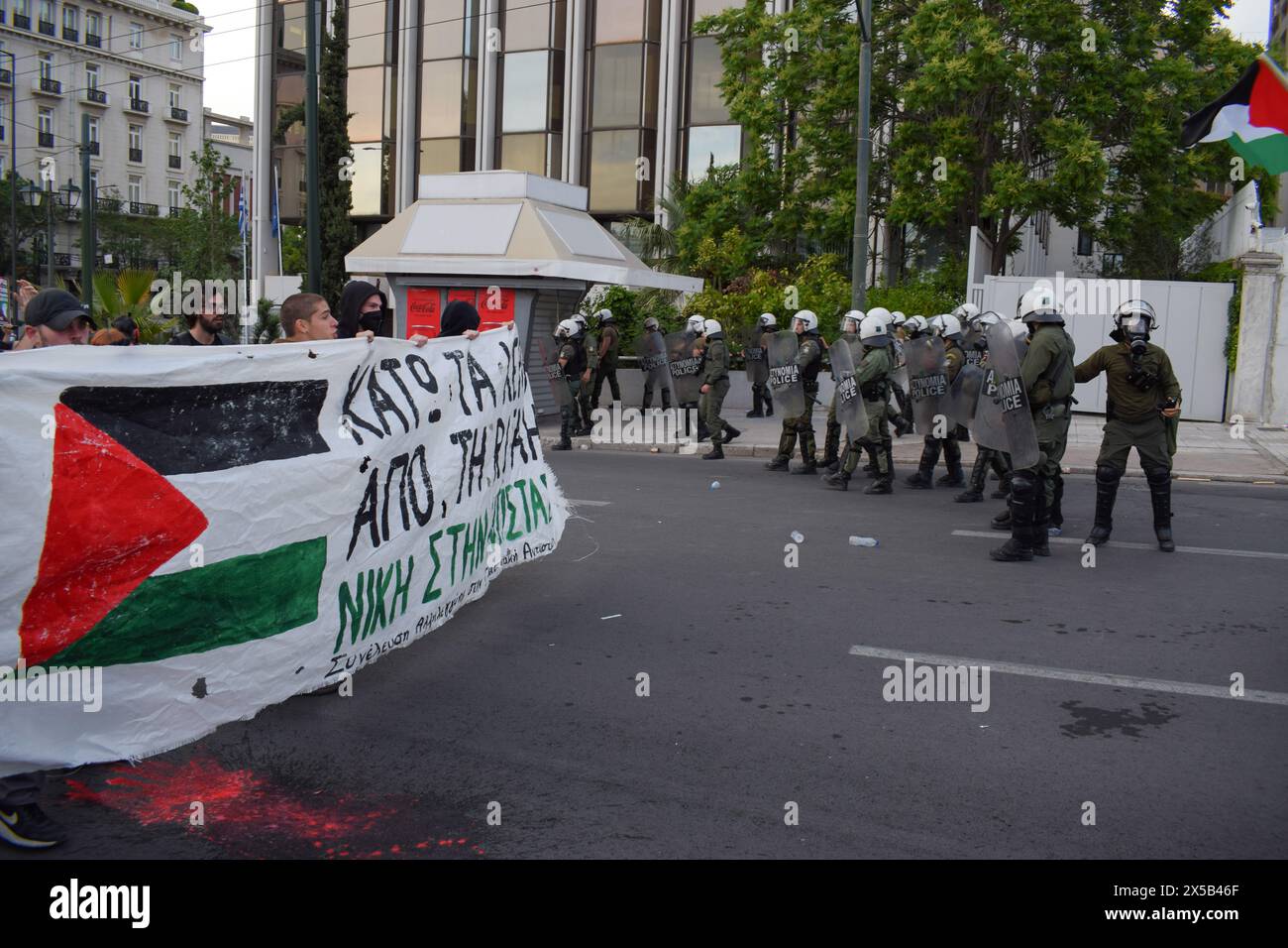 Athens, Greece. 7 May 2024. Protesters with banner march chanting ...
