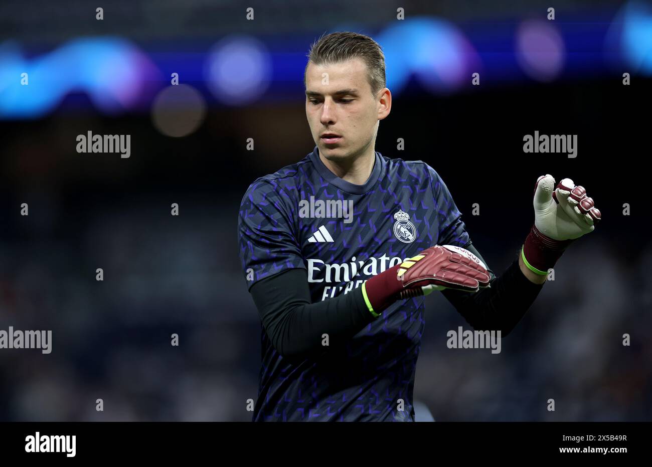 Real Madrid goalkeeper Andriy Lunin warming up before the UEFA ...