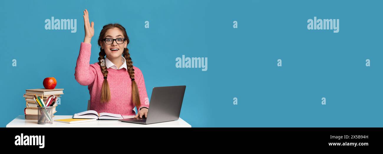 Smart teenage girl with glasses raises hand Stock Photo - Alamy