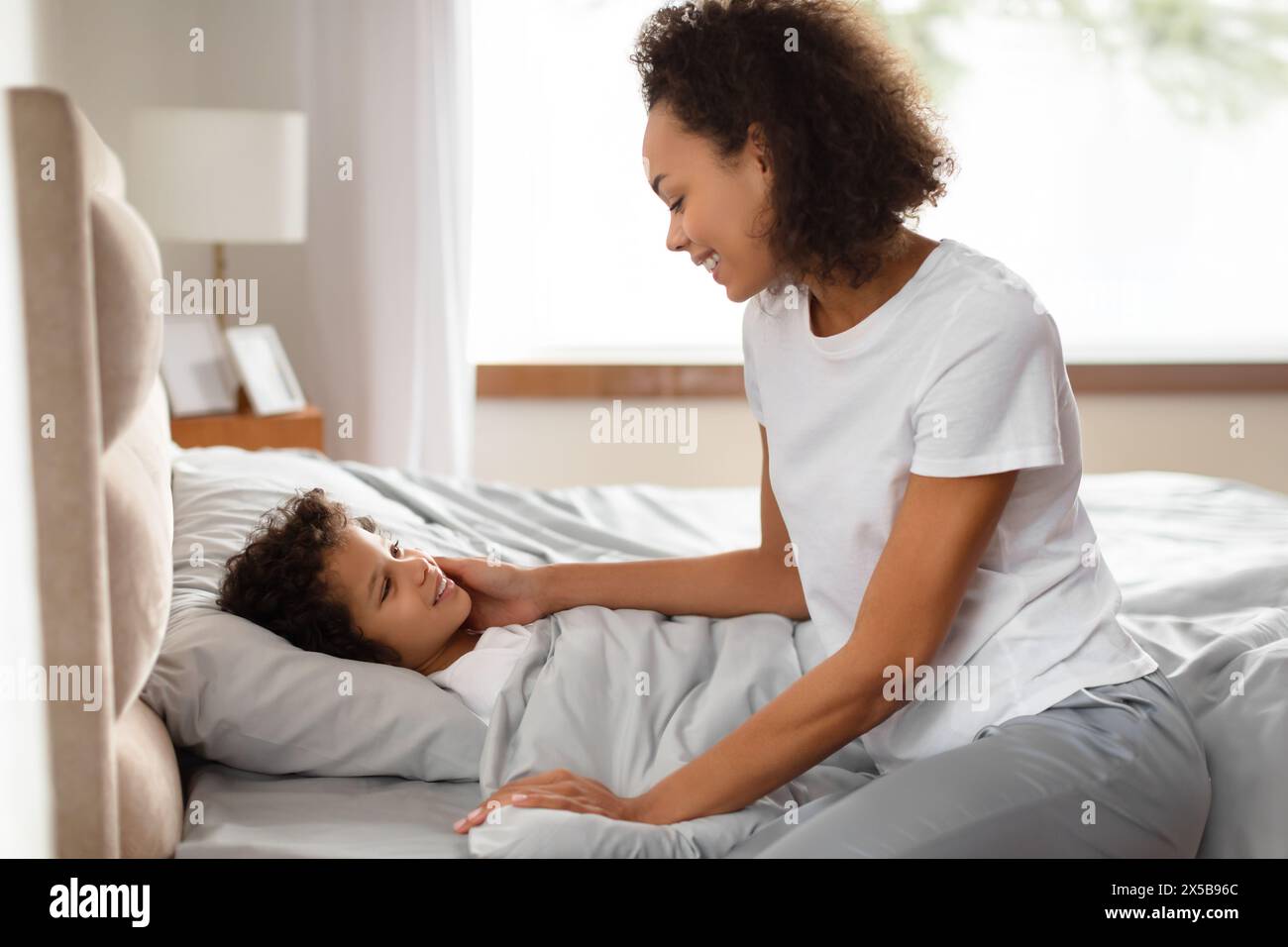 Tender moment between mother son hi-res stock photography and images ...