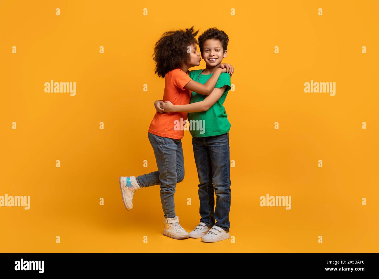 Two children hugging each other hi-res stock photography and images - Alamy
