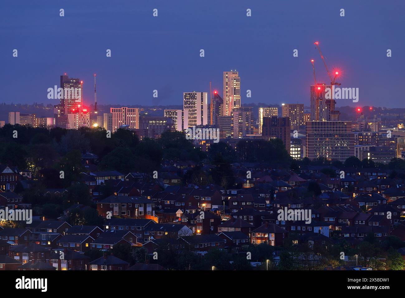 A distant view of Leeds City Centre with the tall buildings rising up ...