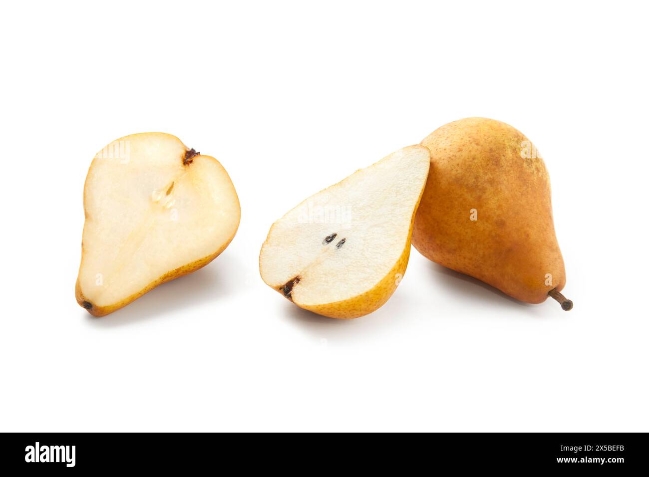 Whole and half of ripe juicy pear fruit with soft shadow isolated on ...