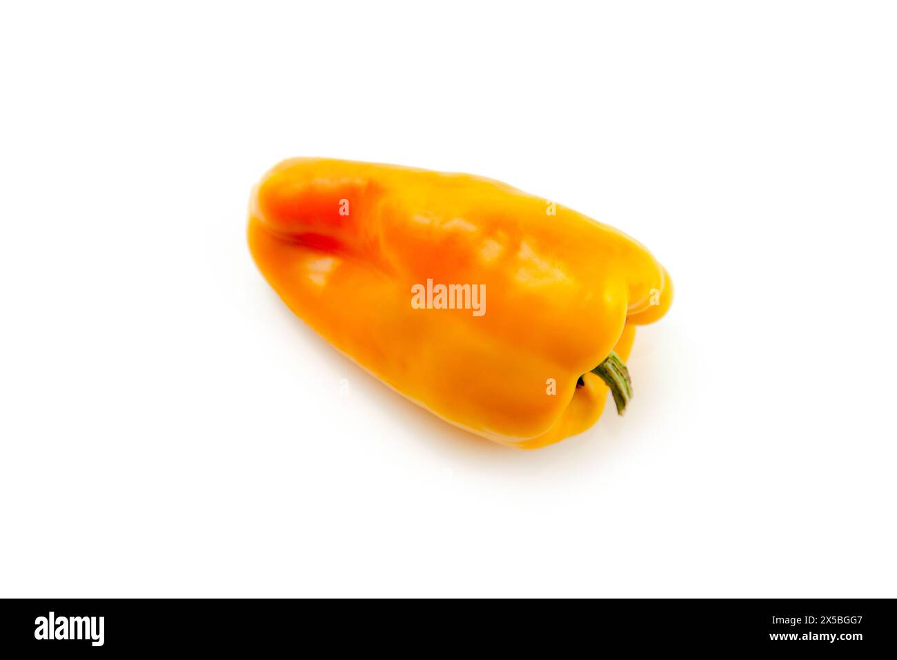 Whole yellow bell pepper (capsicum) known as sweet bell pepper, paprika ...
