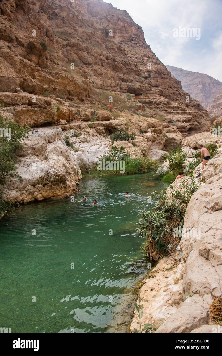 Turquoise water flowing through the Wadi Shab canyon, Wadi Ash Shab ...