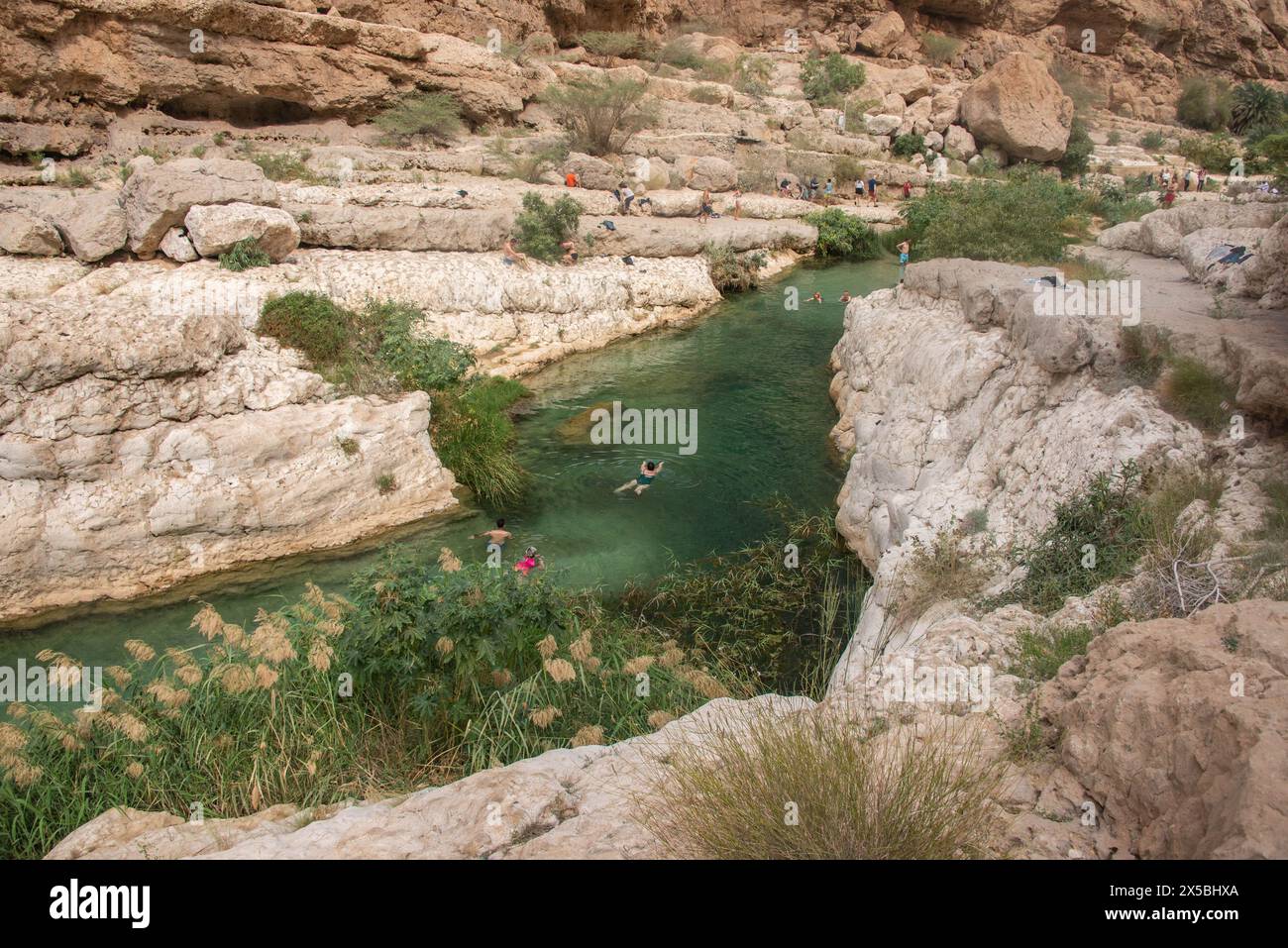 Turquoise water flowing through the Wadi Shab canyon, Wadi Ash Shab ...