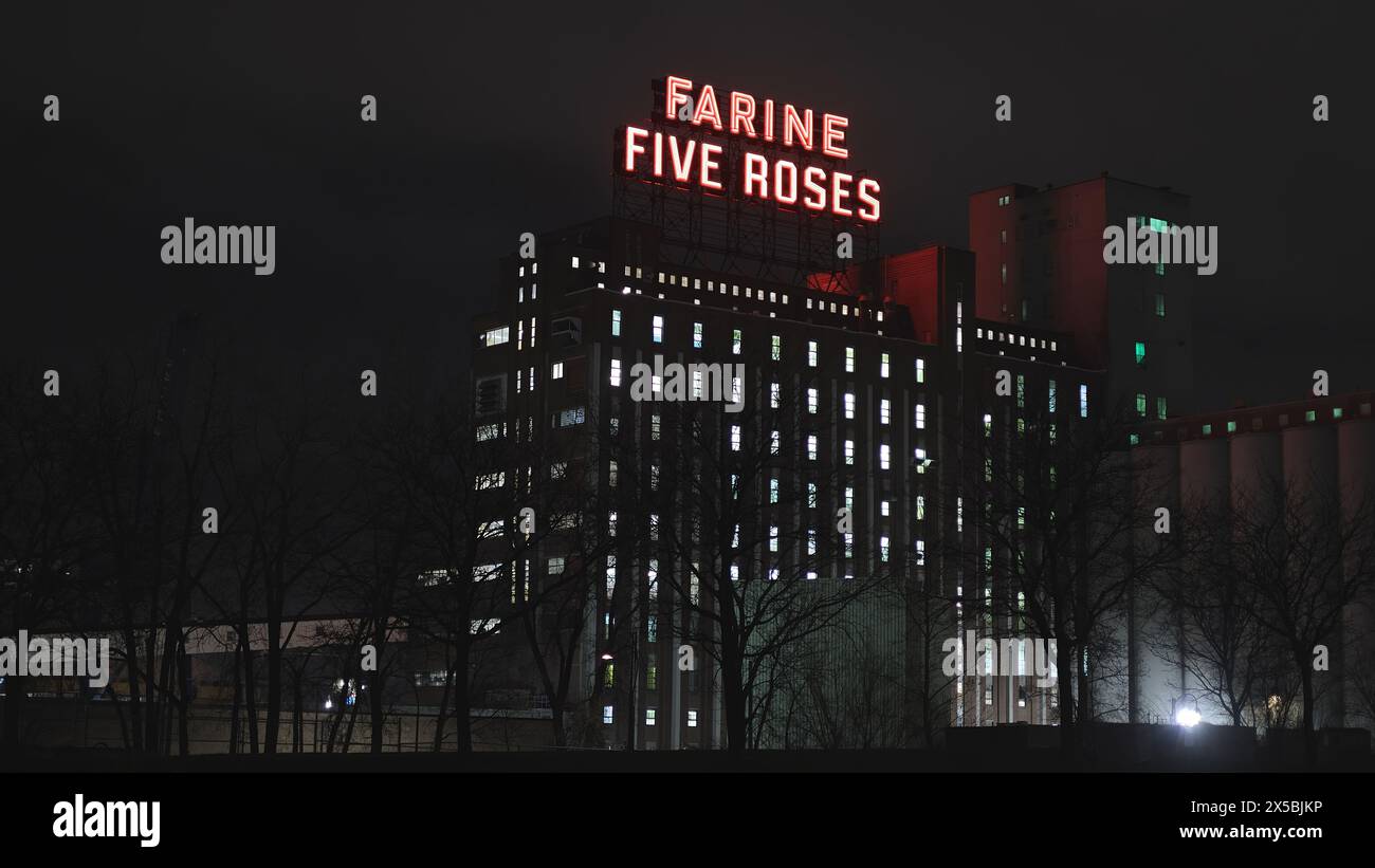 Famous Farine Five Roses building at the port of Montreal at night ...