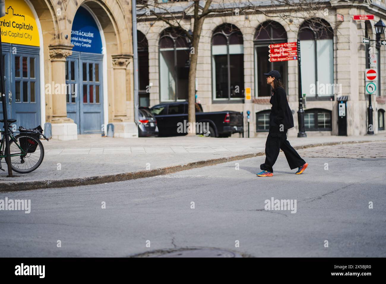 Old woman crossing the street hi-res stock photography and images - Alamy